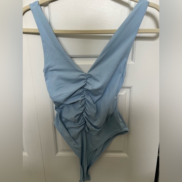 Zara | Tops | Zara Baby Blue Bodysuit | Poshmark